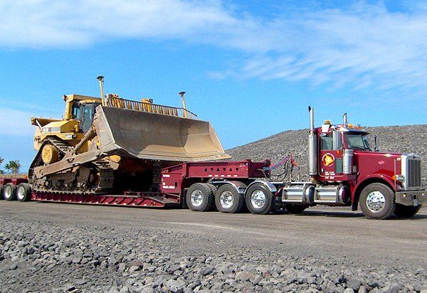 Heavy Equipment transportation and Machine Transport Service
