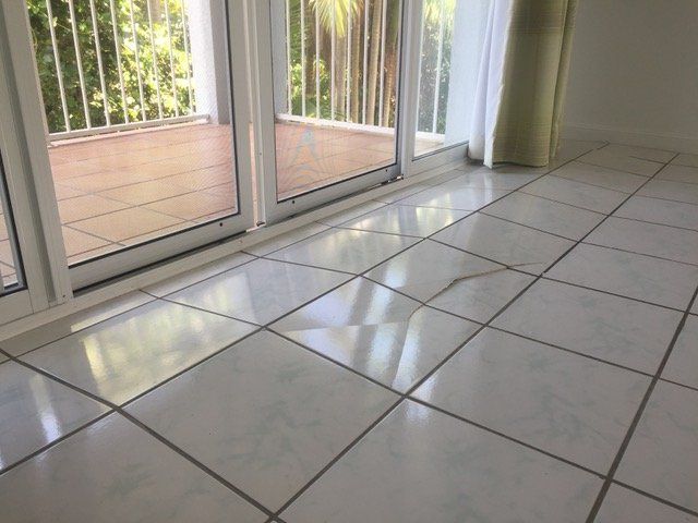 Drummy Tile Repairs | Injectatile Drummy Tile Rectification