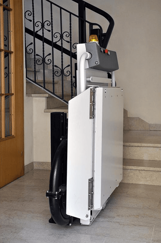 Servoscala a pedana per scale curve - Firenze - Giglio Montascale